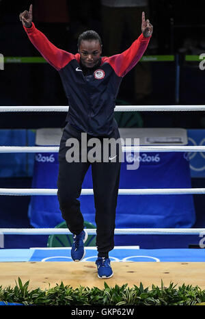 Olympic gold medalist Claressa Shields cheers with family and friends ...
