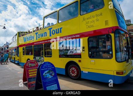 Yellow open topped double decker tour bus, popular tourist attraction ...