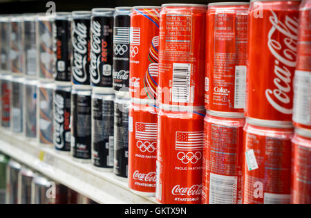 Cans of coke coca cola on sale in a woolworths supermarket in Stock ...
