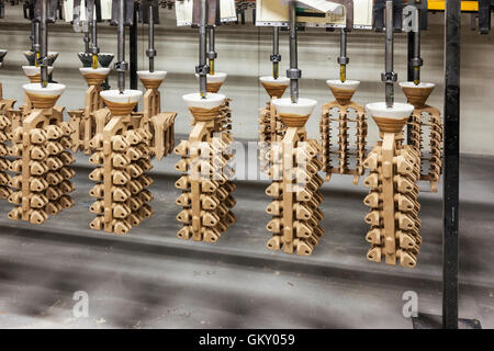 assembly line of casting trees for further processing Stock Photo - Alamy