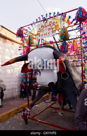 Giant cardboard bull (torito) with fireworks parading during the ...