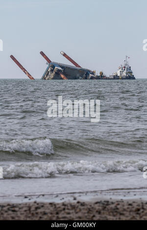 The capsized offhore wind rig SEA WORKER off Nymindegab at the Danish ...