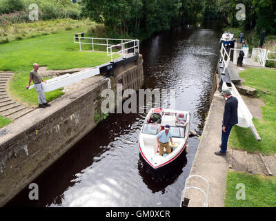 Boat entering a lock on the river Thames; Benson Lock, Benson ...