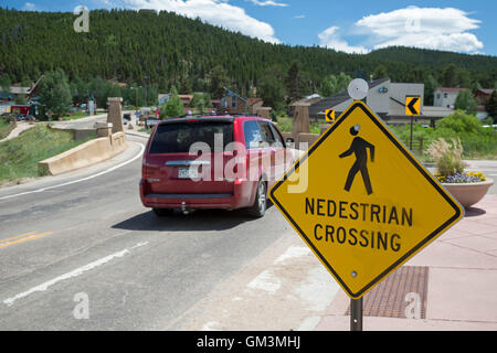 Nederland, Colorado - A pedestrian crossing sign in a Colorado mountain ...