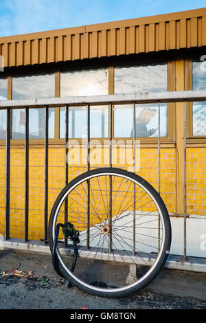 Abandoned broken bicycle wheel Stock Photo - Alamy