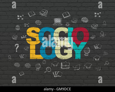 Studying concept: Sociology on wall background Stock Photo - Alamy