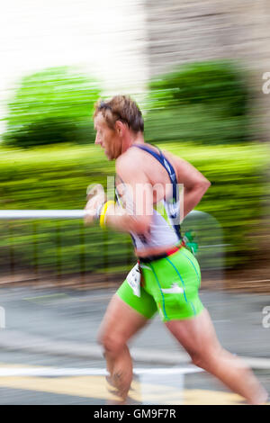 Ironman in Tenby Sep 2013 Stock Photo - Alamy