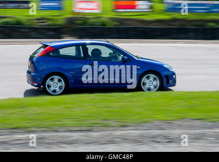 Ford Focus RS Mk1 and 2 high performance hot hatch cars driving on a ...