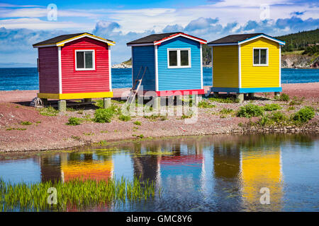Colorful fishing stages with reflections at Cavendish, Newfoundland and ...