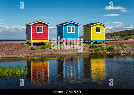 Colorful fishing stages with reflections at Cavendish, Newfoundland and ...
