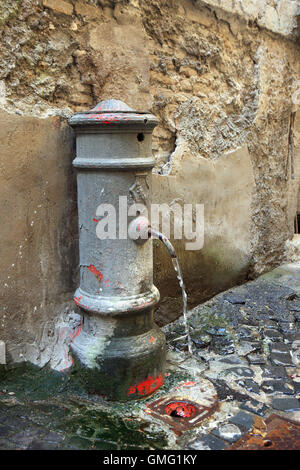 Old drinking water pump in the old town of Kotor, Montenegro Stock ...