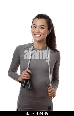 female with a skipping rope around her neck Stock Photo - Alamy