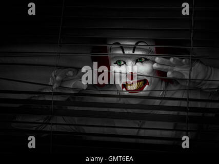 Eerie Creepy Clown Looking Through Stage Curtain Drapes Stock Photo - Alamy