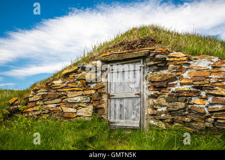An in-ground root cellar at Elliston, Newfoundland and Labrador, Canada ...
