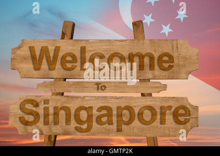 Welcome to Singapore sign on wood background Stock Photo - Alamy