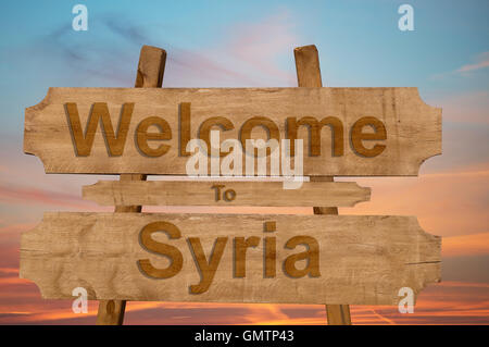 Welcome to Syria sign on wood background with blending national flag ...