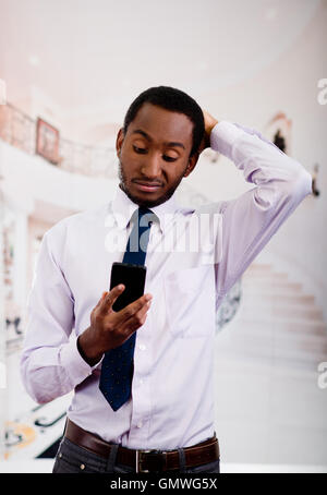 Photo of serious thoughtful guy dressed eyewear hand arm chin reading ...