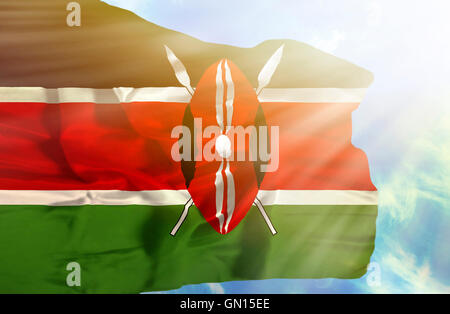 Kenya waving flag against blue sky with sunrays Stock Photo - Alamy