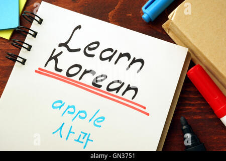Learn korean written in a notepad. Education concept Stock Photo - Alamy