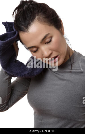 female with a towel over her shoulder Stock Photo - Alamy
