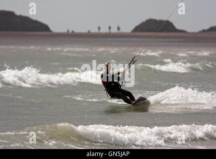 Surfing waves at Llanddwyn Island, Anglesey Stock Photo - Alamy