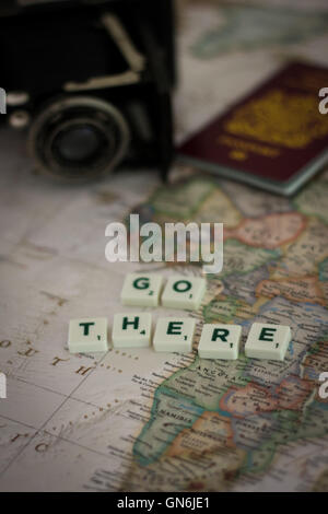 World map with words and quote using lettered tiles Stock Photo - Alamy