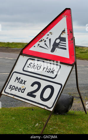 Road works sign skid risk max speed 20 MPH Fen Road Milton Stock Photo ...