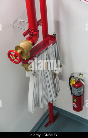 Standpipe Firefighting Equipment in Stairwell Stock Photo - Alamy