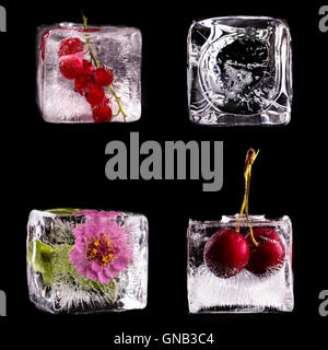 Frozen ice cubes with various fruits, blackberries and raspberries ...