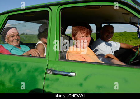 ROMANIA Banat, village Semlac, farm worker in romanian car Dacia Stock ...