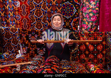 Uzbekistan, Fergana region, Marguilan, bazaar, silk market Stock Photo ...