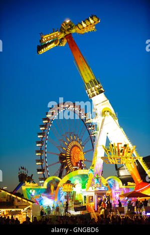 Oktoberfest, Wiesn, amusement rides, giant rotating pendulum at night ...