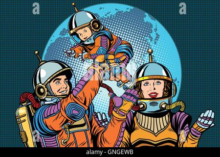 Family of astronauts mom, dad and child dance in a circle in space ...