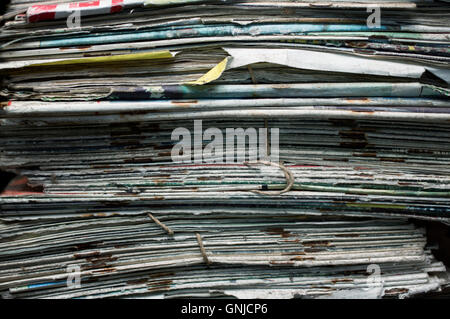 Stack of old magazines. pile of retro newspapers. vintage journals lie ...