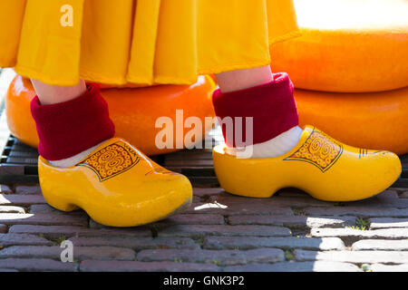 Dutch clogs traditional shoes and socks worn by woman Kaasmeisje Stock ...