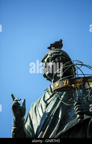 A vertical shot of Nicolaus Copernicus Statue in Torun, Poland Stock ...