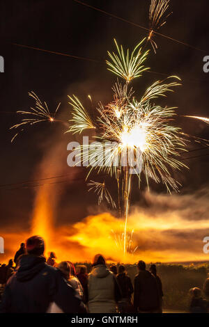 Bonfire night with crowd and fireworks in the UK Stock Photo - Alamy