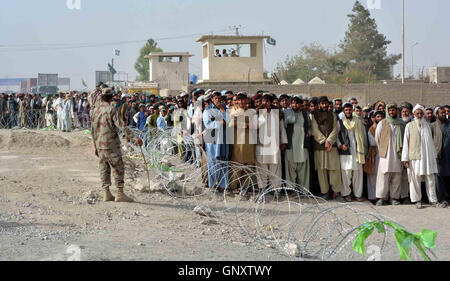 Afghan people at Friendship-Gate, Chaman are waiting to open border to ...