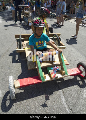 Activity children compete in the city street Stock Photo - Alamy