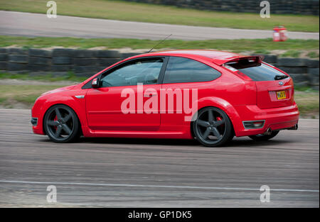 2nd Generation Ford Focus ST high performance hot hatch car driving on ...