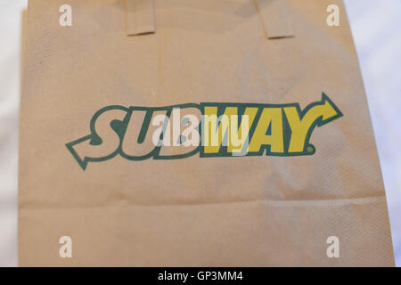 Brown paper subway bag showing the subway logo Stock Photo - Alamy