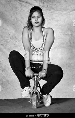 Woman riding cycle in circus, india, asia Stock Photo - Alamy