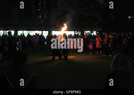 With burning metal structures, cascading candles and flickering ...