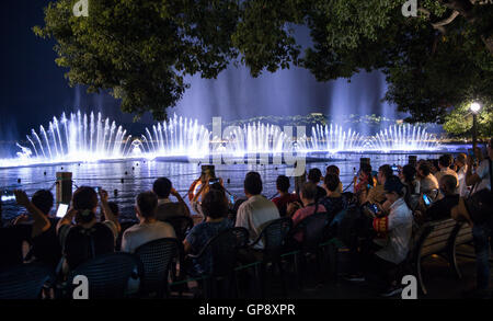 Visitors enjoy the 3rd West Lake Lotus Exhibition featuring over 50 ...