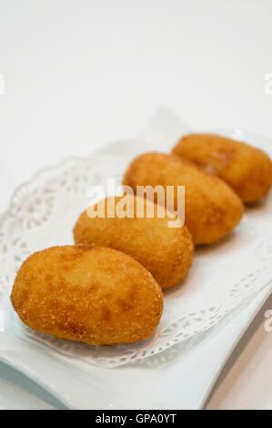 Croquettes serving. Close view Stock Photo - Alamy