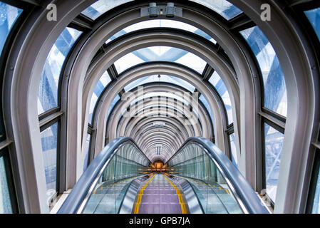 View of the spectacular escalator in Japan Building, a modern high rise ...
