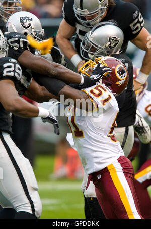 Washington Redskins linebacker Robert Henson (51) puts on his helmet ...