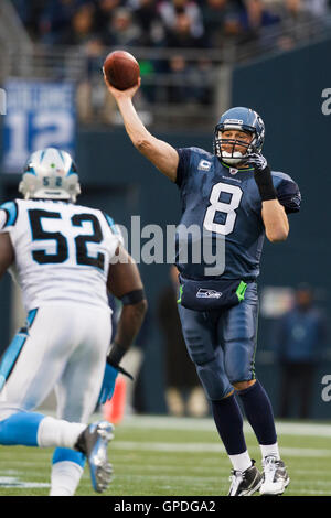 Carolina Panthers' Jon Beason (52), Chris Gamble (20), and Chris Harris ...