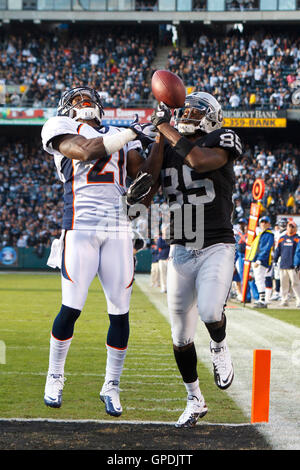 Denver Broncos cornerback Andre' Goodman stretches during a preseason ...