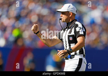 NFL Referee Clete Blakeman, second from right, talks to umpire Scott ...